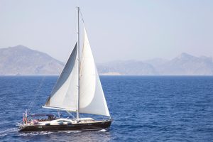 Why Do Sailboats Have Two Sails? (Explained) - WaterCraft 101